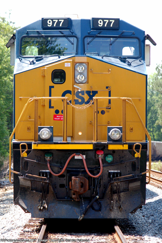 CSX ES44AC #977, serving as sole power for empty Mulberry (FL) bound phosphate train K893, is ...